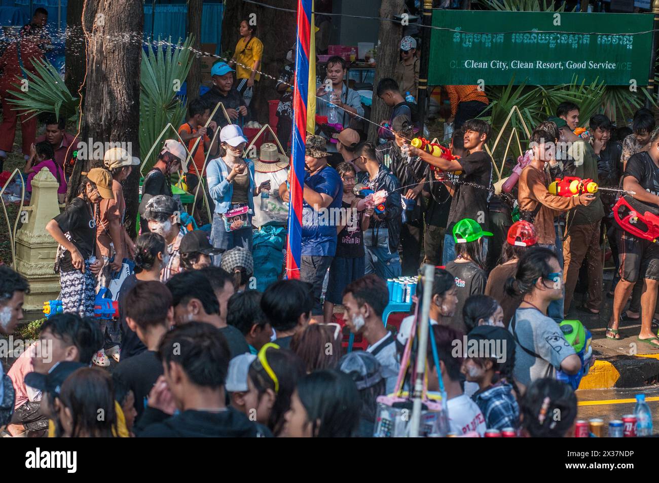 A water gun battle during The Cambodian New Year festival. Wat Phnom ...