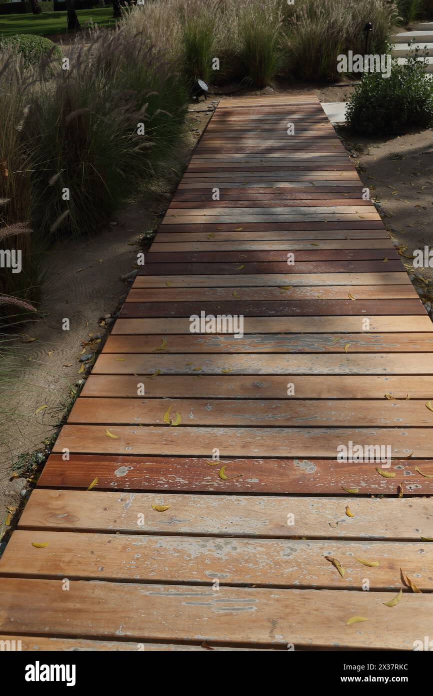 Worn Wood Panelled Walkway in The Chedi Hotel Gardens Muscat Oman Stock ...