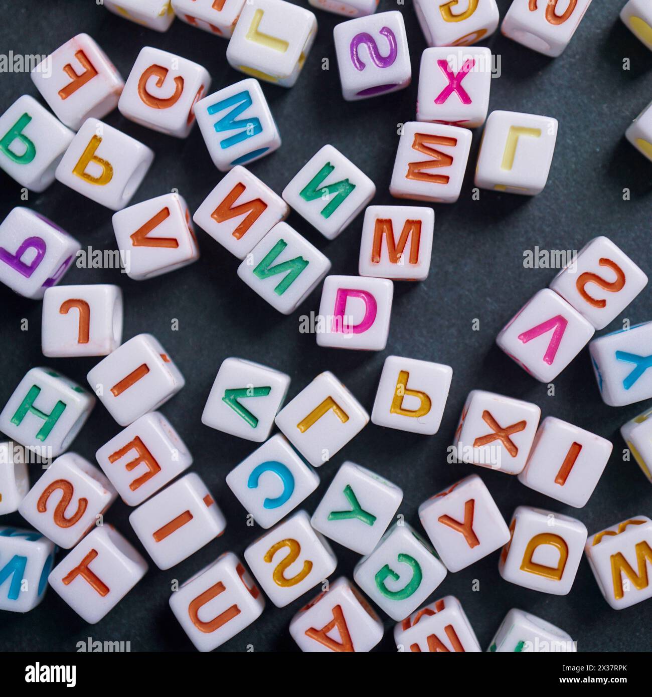 Colorful letter cubes, toy and education Stock Photo - Alamy