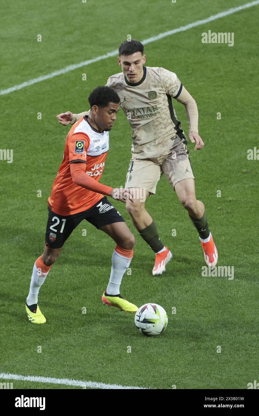 Julien Ponceau of Lorient, Manuel Ugarte of PSG during the French ...