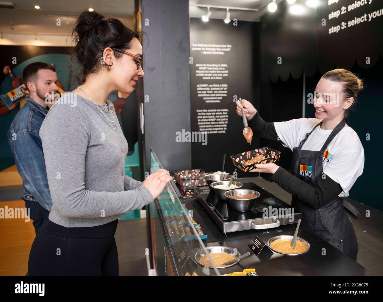EDITORIAL USE ONLY Members of the public visit 'the KIND bar', a free ...