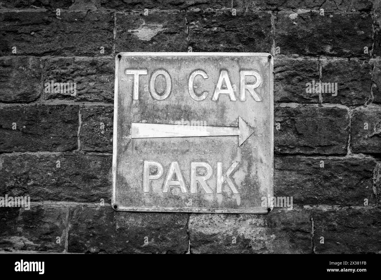 Brick wall signage Black and White Stock Photos & Images - Alamy