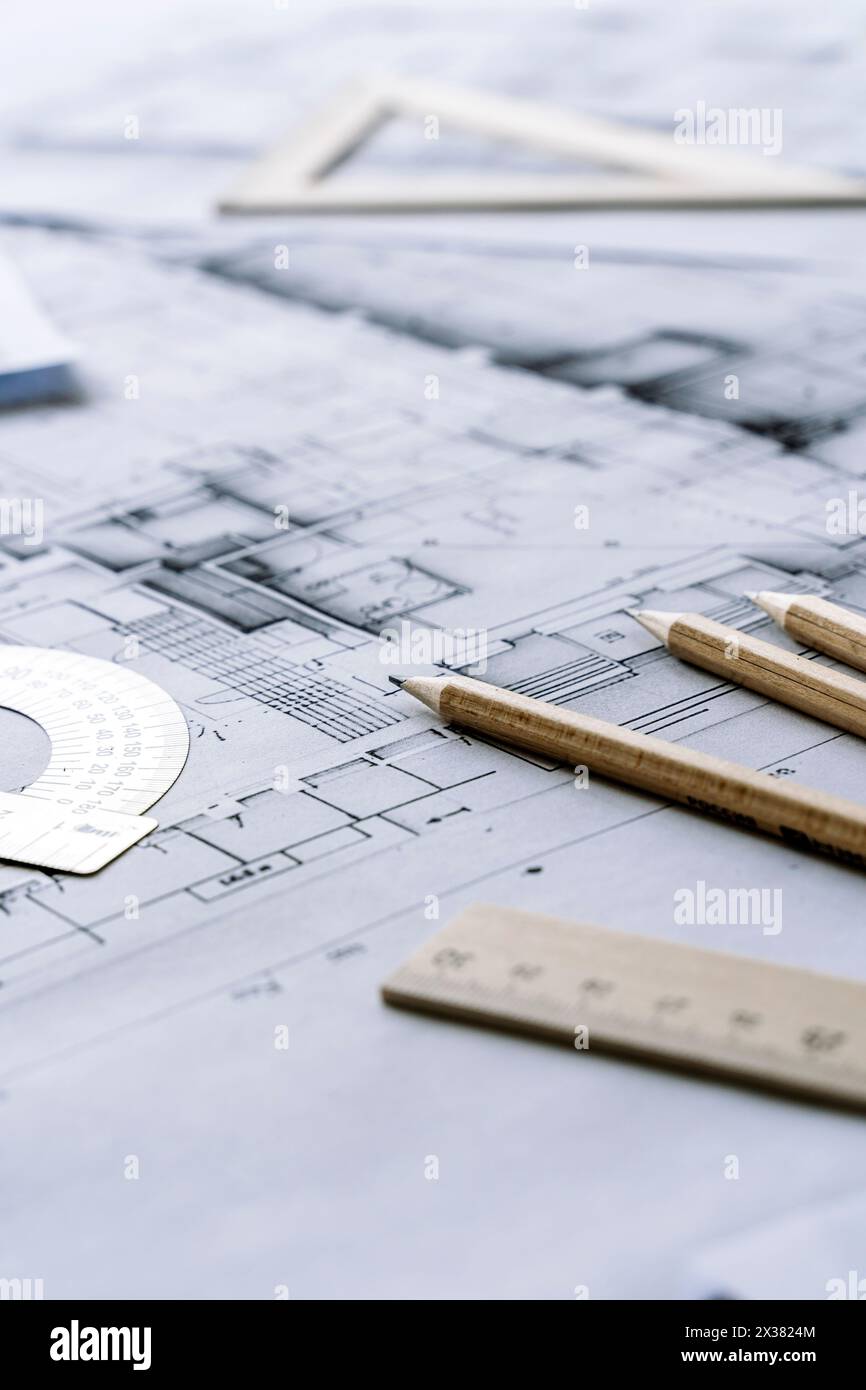 Architectural engineering design plan drawing on the table. Architect's ...