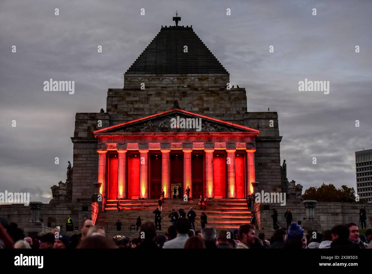Shrine of Remembrance is lit with red during ANZAC Day Dawn Service, at ...