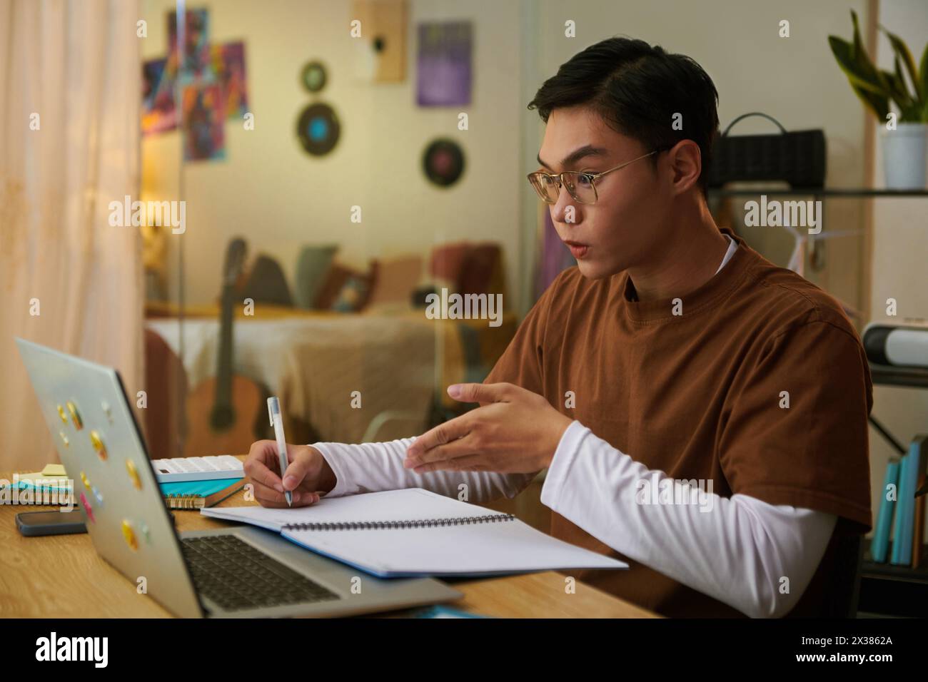 High school student speaking in online class Stock Photo - Alamy