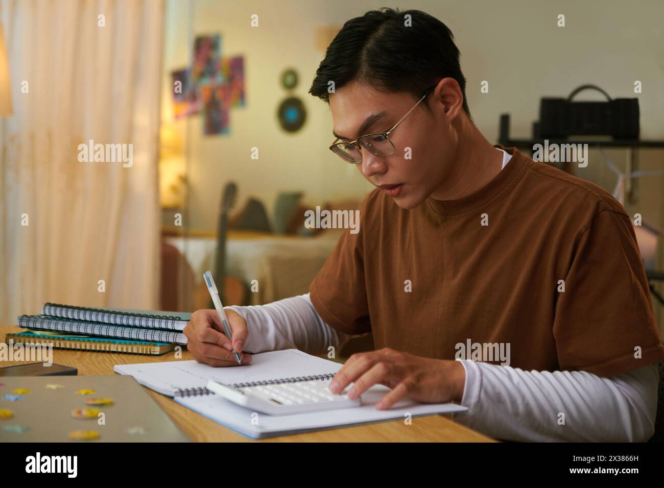 Higher school student preparing for math practice test Stock Photo - Alamy