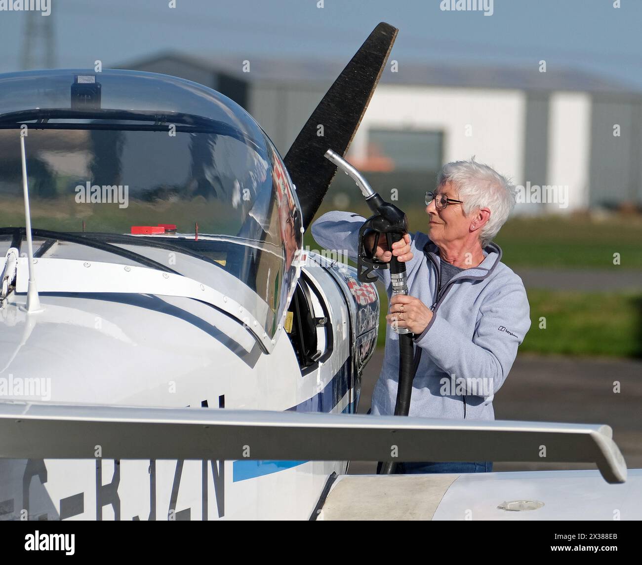 Refueling light aircraft at small airfield fuel pumps Stock Photo - Alamy