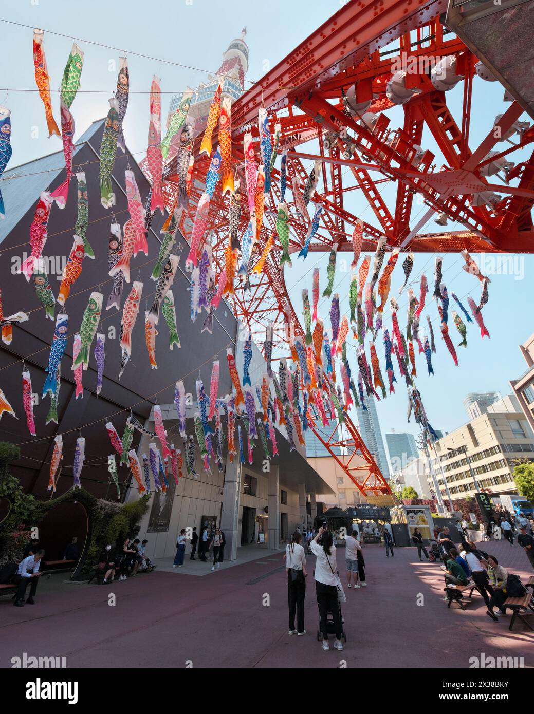 Tokyo, Japan. 25th Apr, 2024. Visitors take pictures of Carp Streamers ...