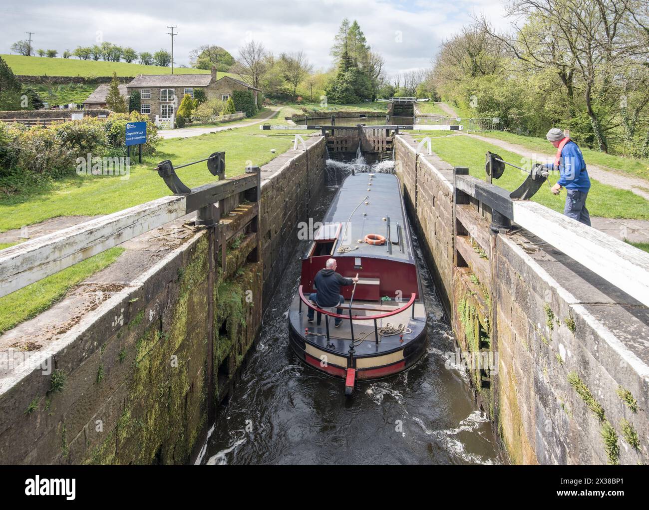 Boat has just entered Carpenters lock near Gargrave, Leeds Liverpool ...
