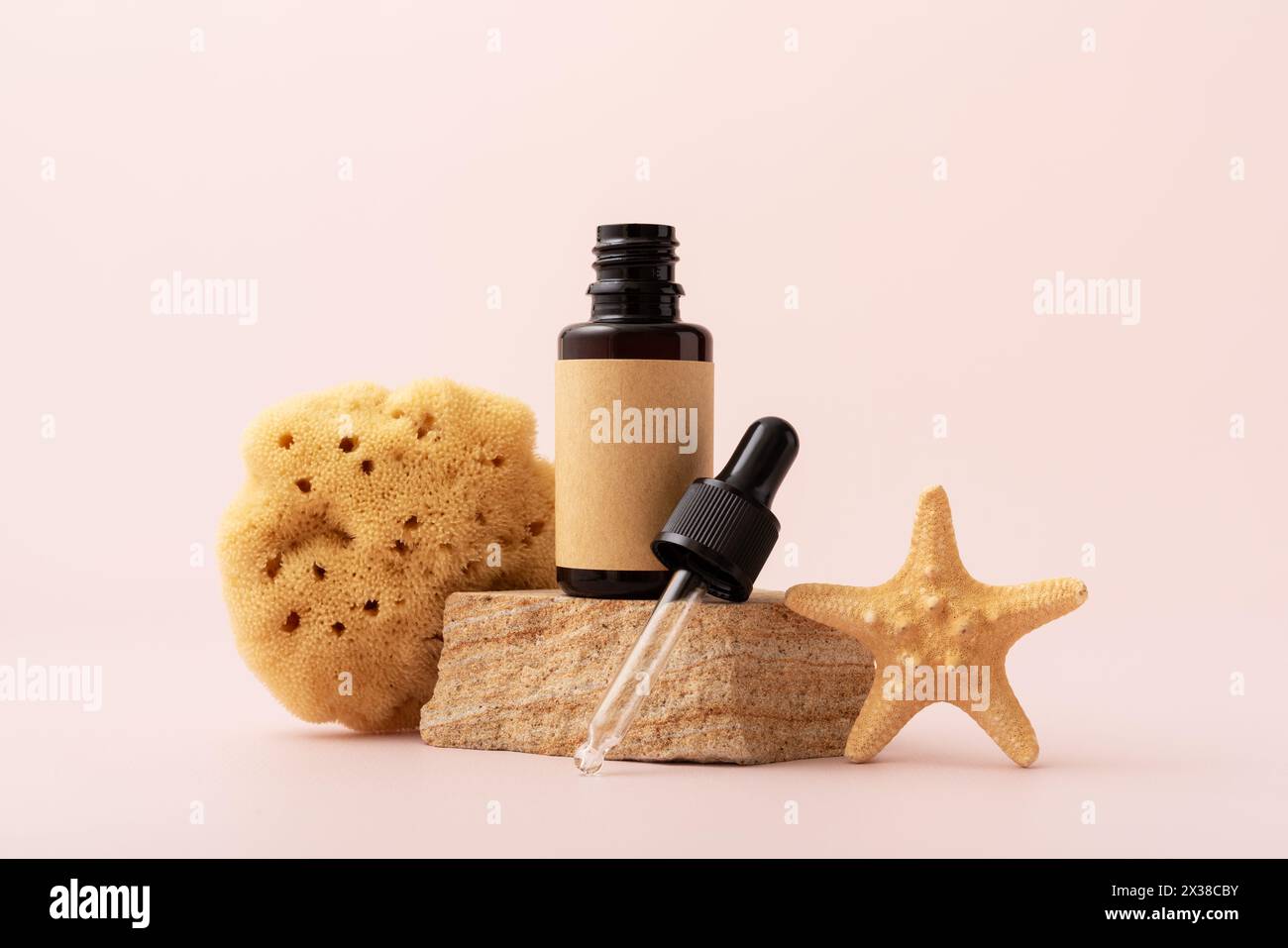 Brown glass serum bottle for organic cosmetic with sea minerals. Mock ...