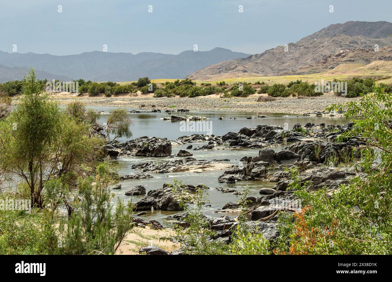 Low water revealing rocks and islands in the Orange in Namibia with ...