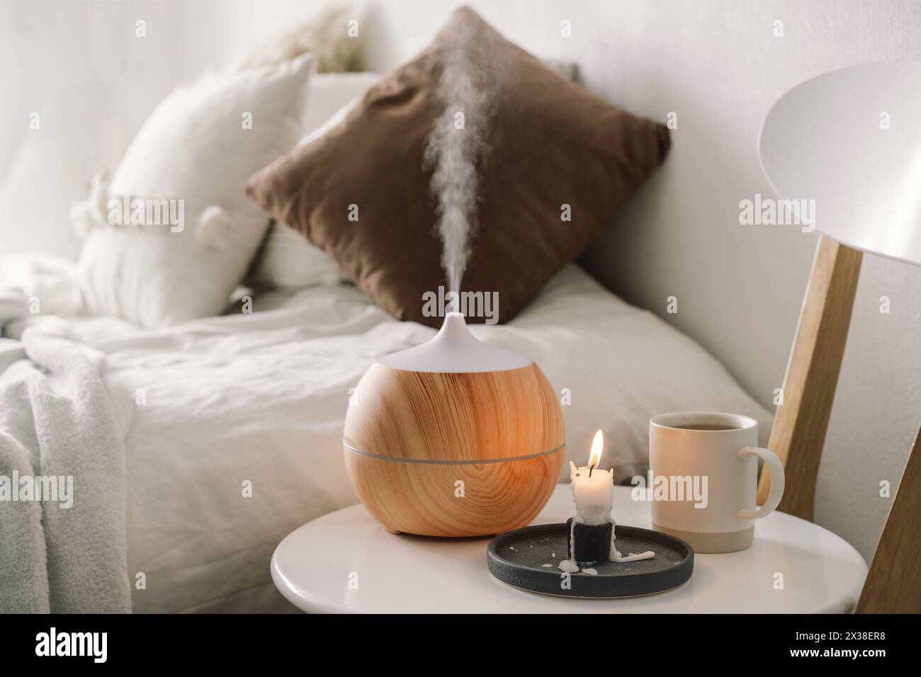 Aromatherapy Concept. Aroma oil diffuser on chair against in the ...