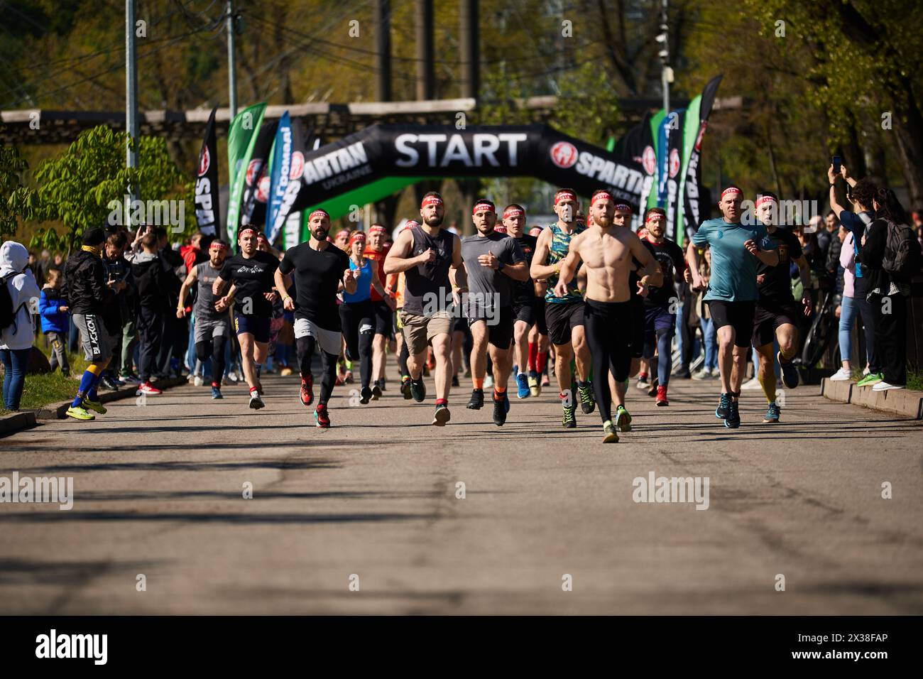 Group of athletes starting the marathon run at the Spartan Race ...