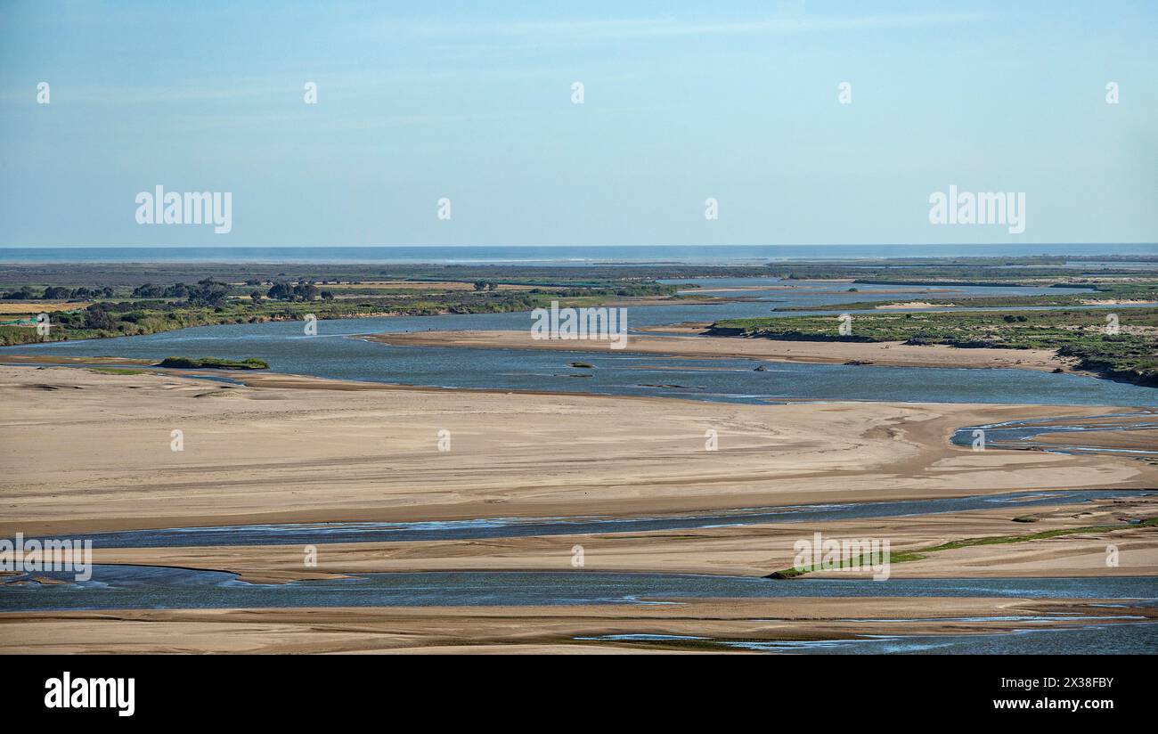 Panorama of the Orange River Estuary at low tide with the fog bank out ...