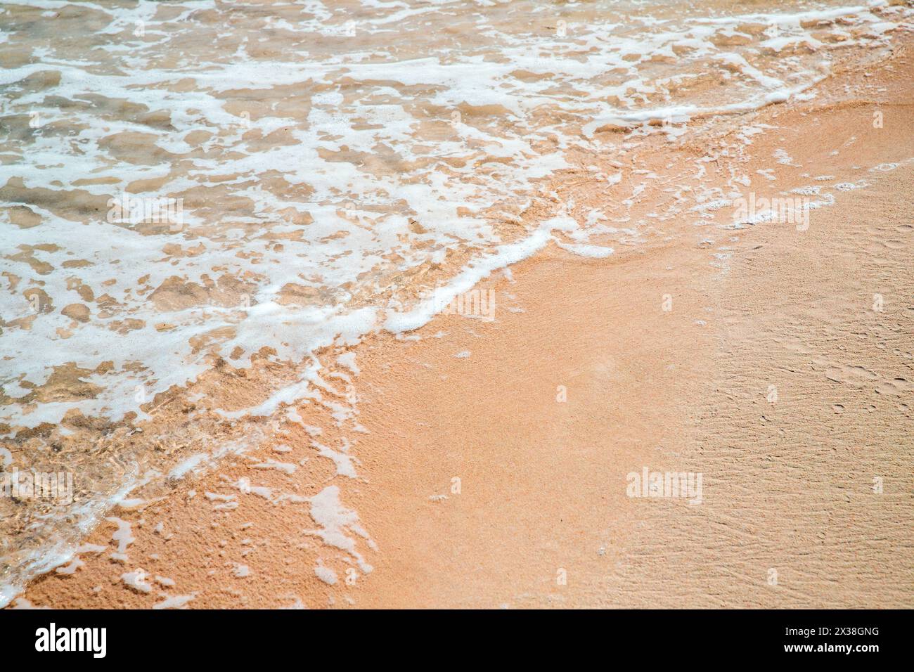 Wet coastal sand and sea shore water, abstract natural background photo ...