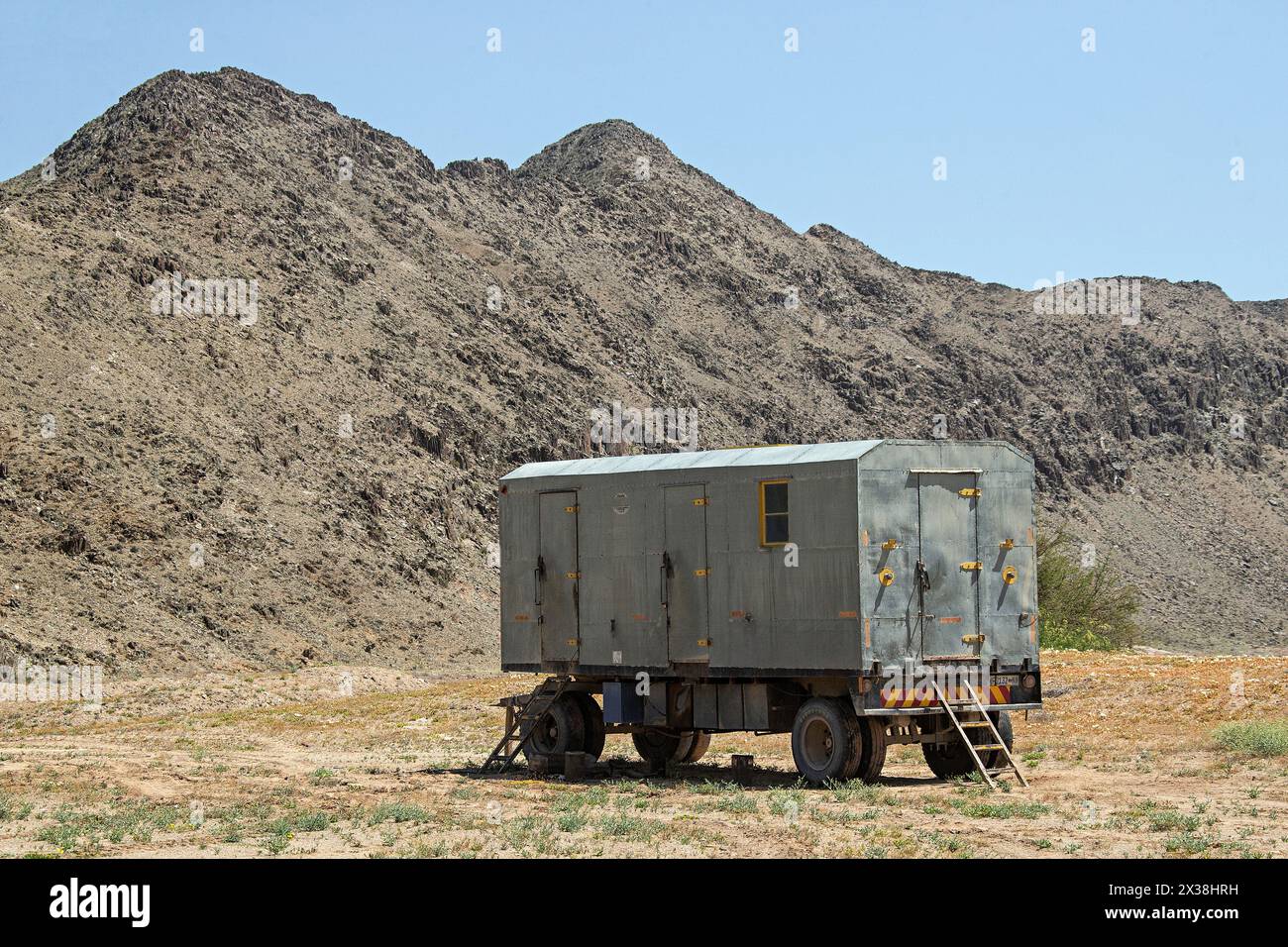 The mobile home of the grader operator who repairs the road along the ...