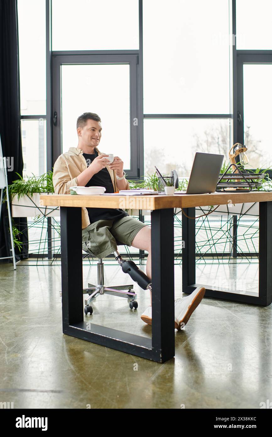 A handsome businessman with a prosthetic leg working diligently on a ...