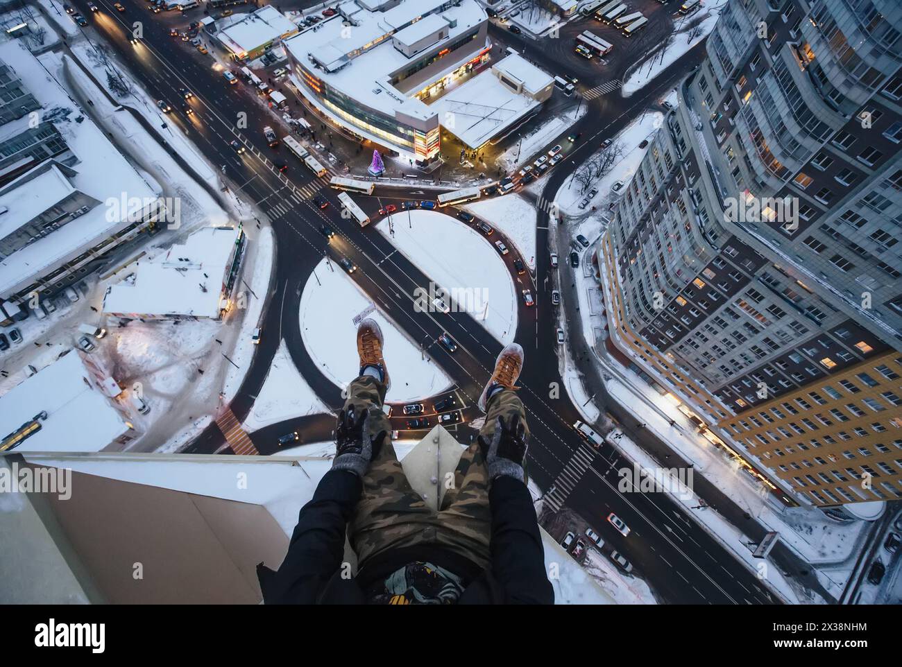 Guy sitting high on snow hi-res stock photography and images - Alamy