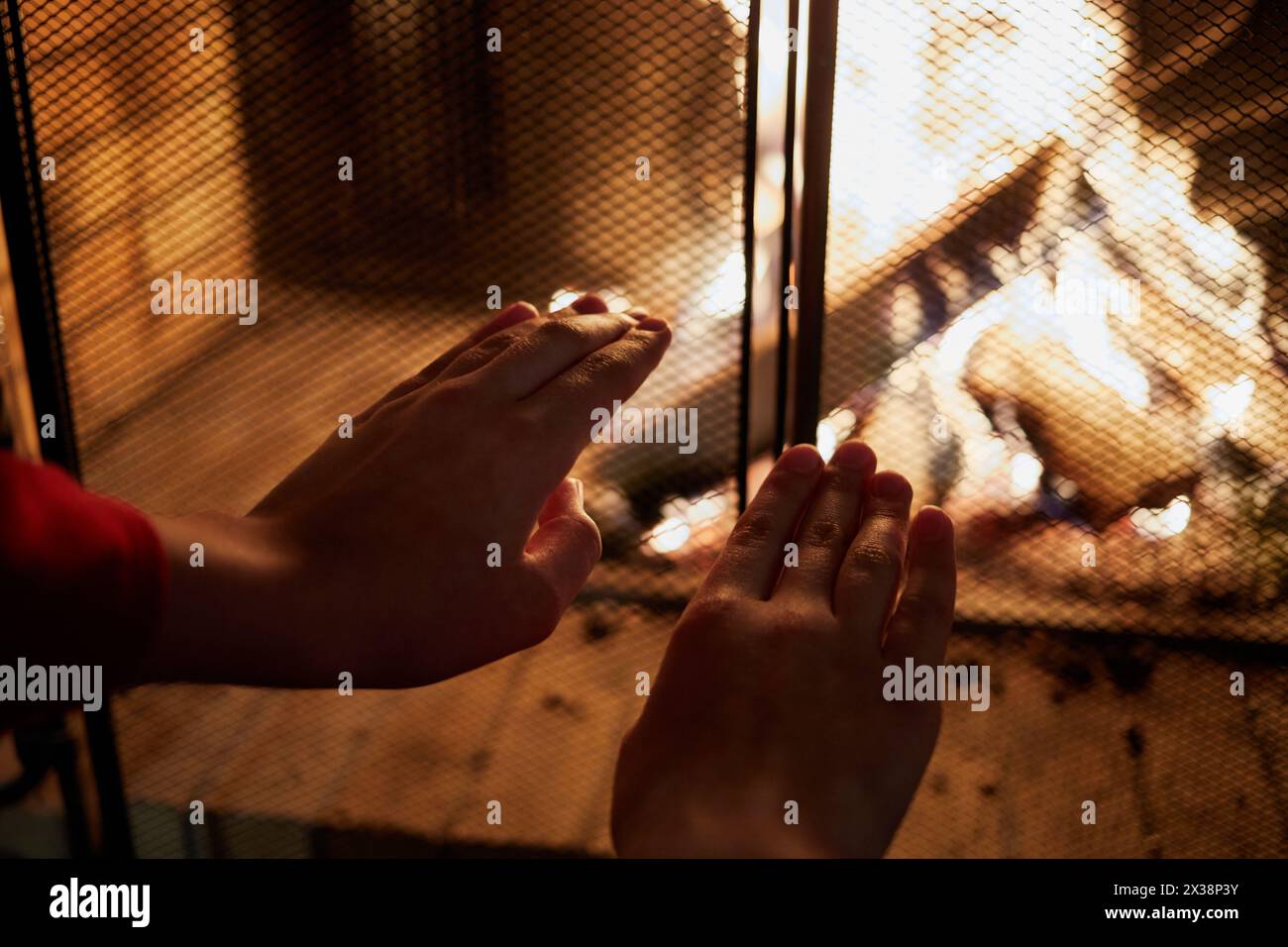 Human hands warming at fire Stock Photo - Alamy