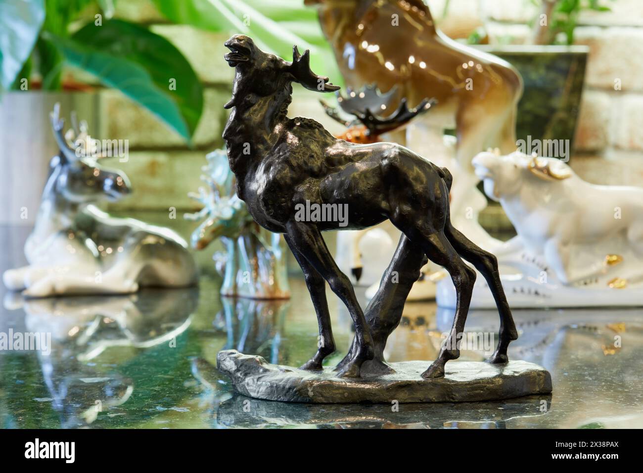 MOSCOW, RUSSIA - OCT 28, 2016: Metal figurine of roaring elk at private ...