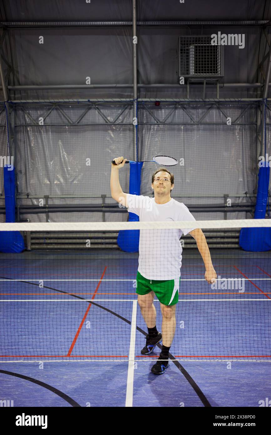Man badminton player at sports ground Stock Photo - Alamy