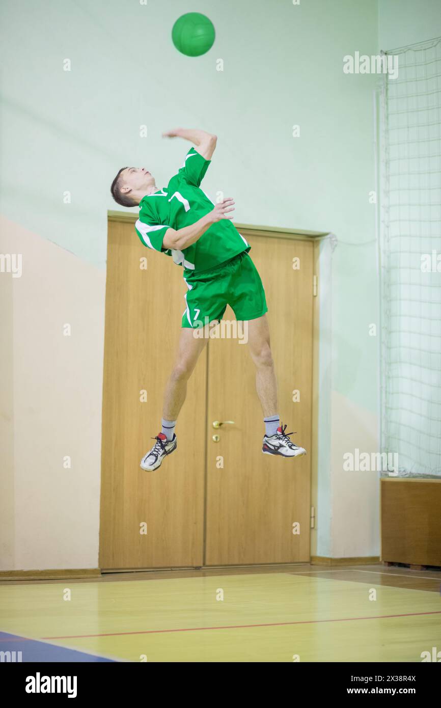 Male volleyball player jumps hi-res stock photography and images - Alamy