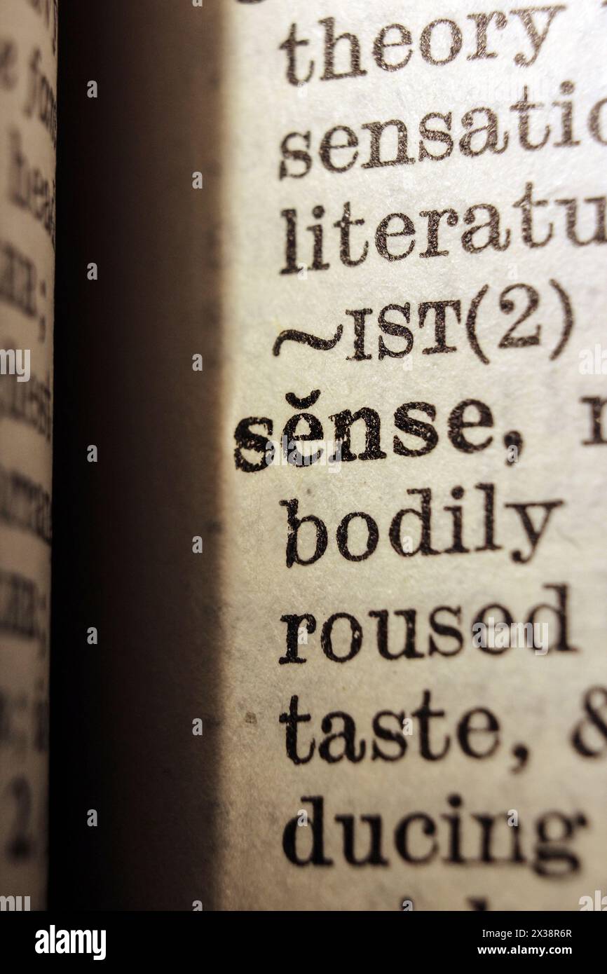 Word sense on dictionary page, macro close-up Stock Photo - Alamy