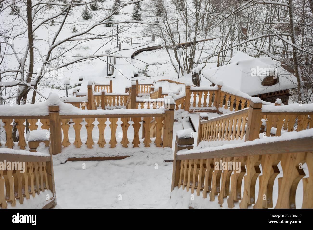 Wooden stairs with carving in Russian Orthodox Monastery at winter day ...