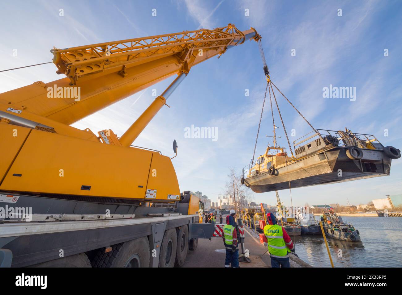 MOSCOW - NOV 21, 2016: Lifting of ship with crane to shore for ...