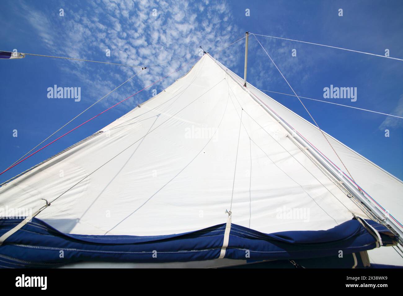 Big white sail of modern yacht sailing on river at summer sunny day ...