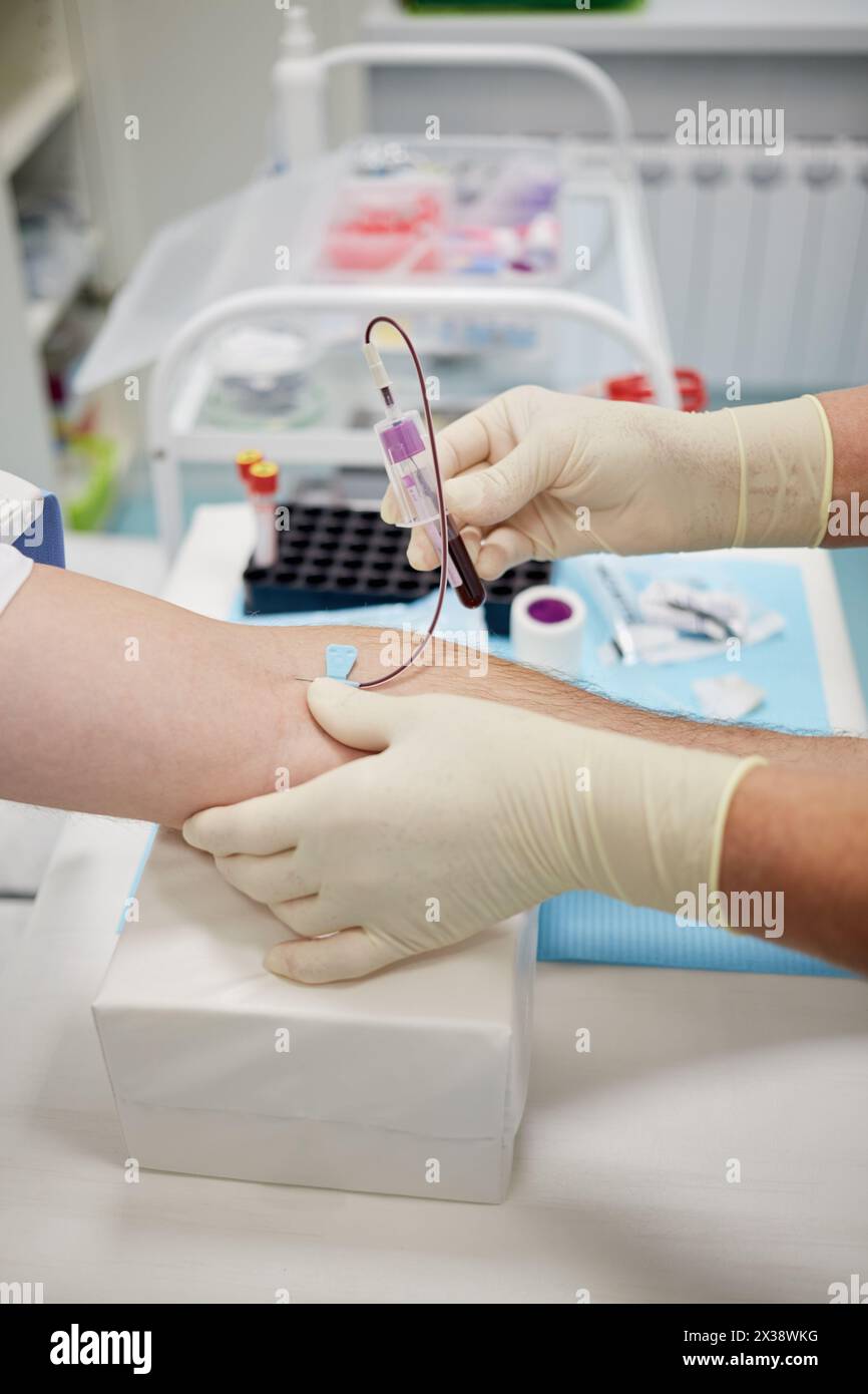 Syringe tourniquet needle arm hi-res stock photography and images - Alamy