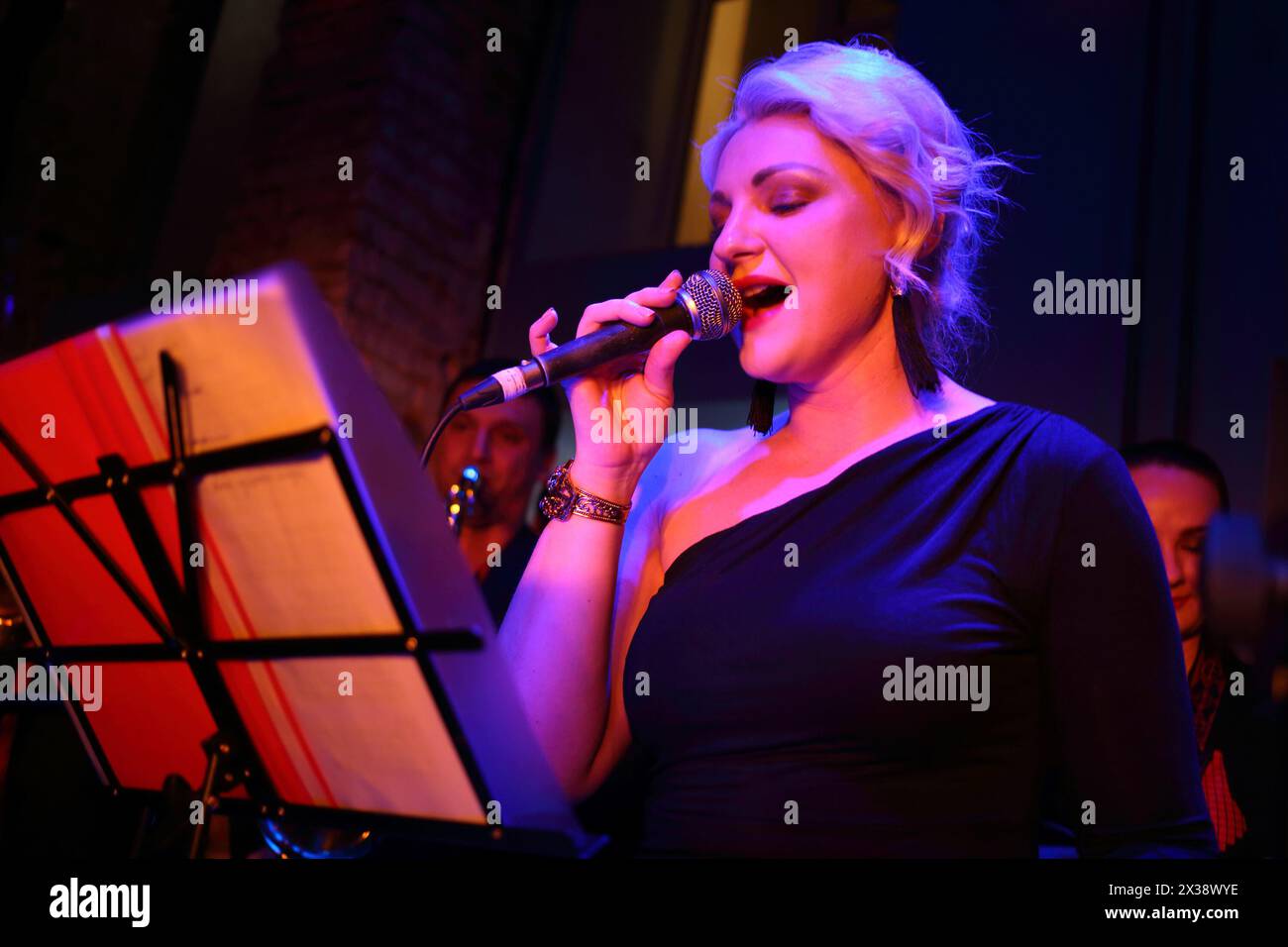 Female smile stage suit hi-res stock photography and images - Alamy