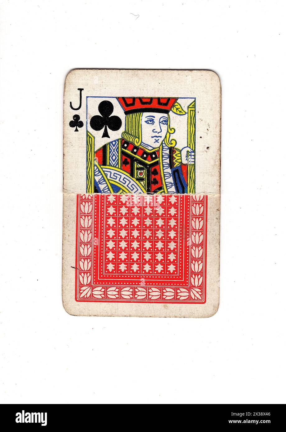 A torn jack of clubs vintage playing card showing the front and back on ...