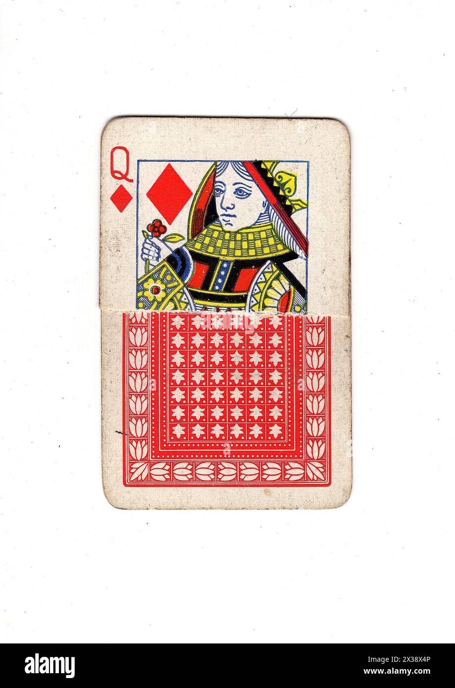A torn queen of diamonds vintage playing card showing the front and ...