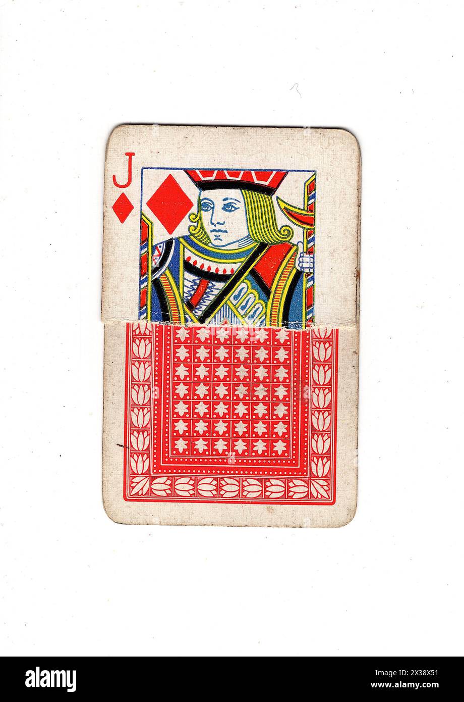 A torn jack of diamonds vintage playing card showing the front and back ...