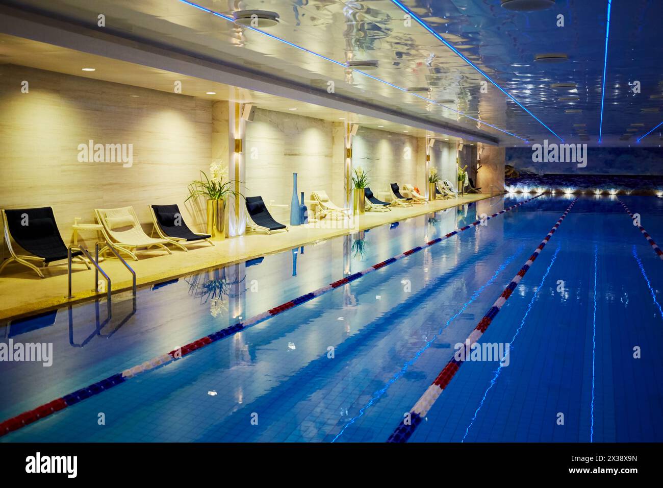 MOSCOW, RUSSIA - NOV 14, 2015: Swimming pool with dividers and lounges ...
