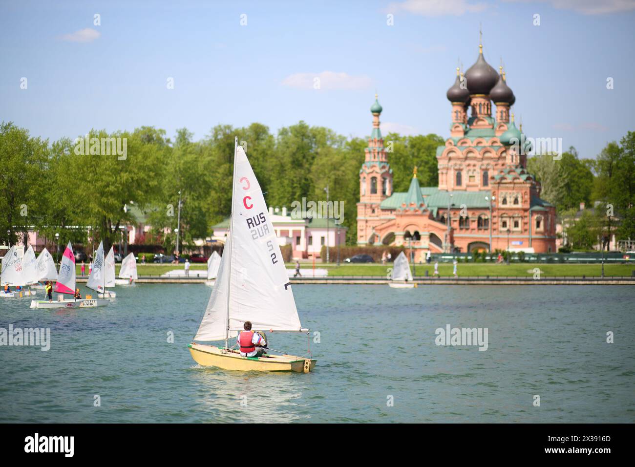 MOSCOW - MAY 09, 2016: White sailboats with participants of the ... MOSCOW - MAY 09, 2016: White sailboats with participants of the ...