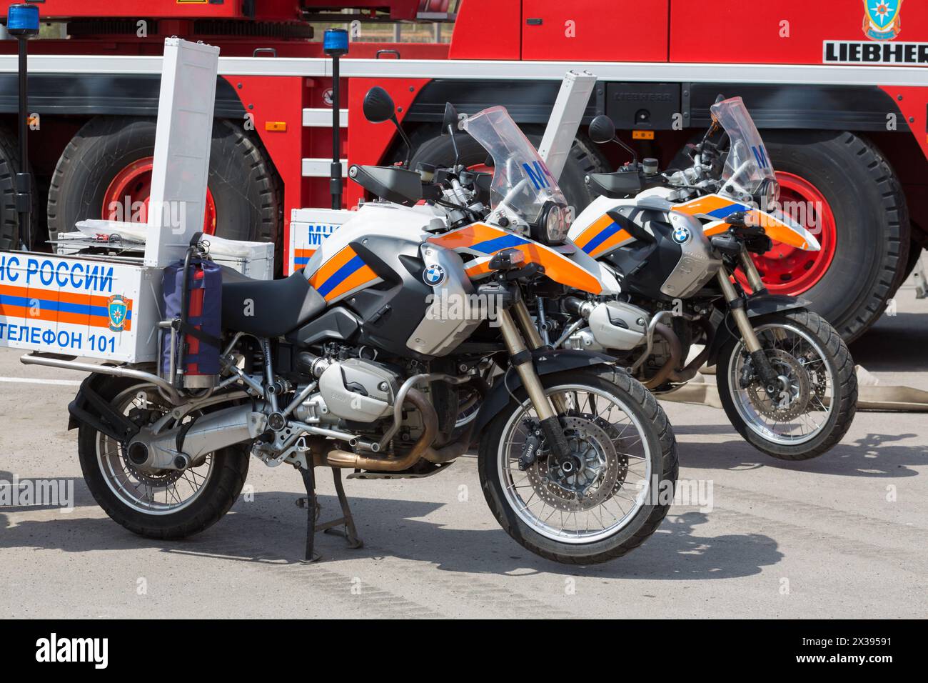 MOSCOW - MAY 29, 2015: Red fire-engine and two motorcycle with fire ...