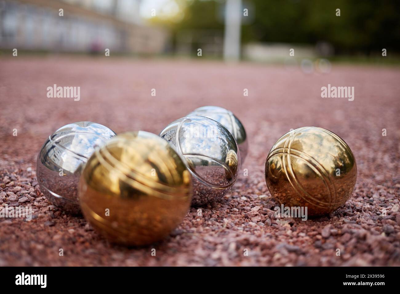 Group of petanque balls lying on ground, shallow dof Stock Photo - Alamy