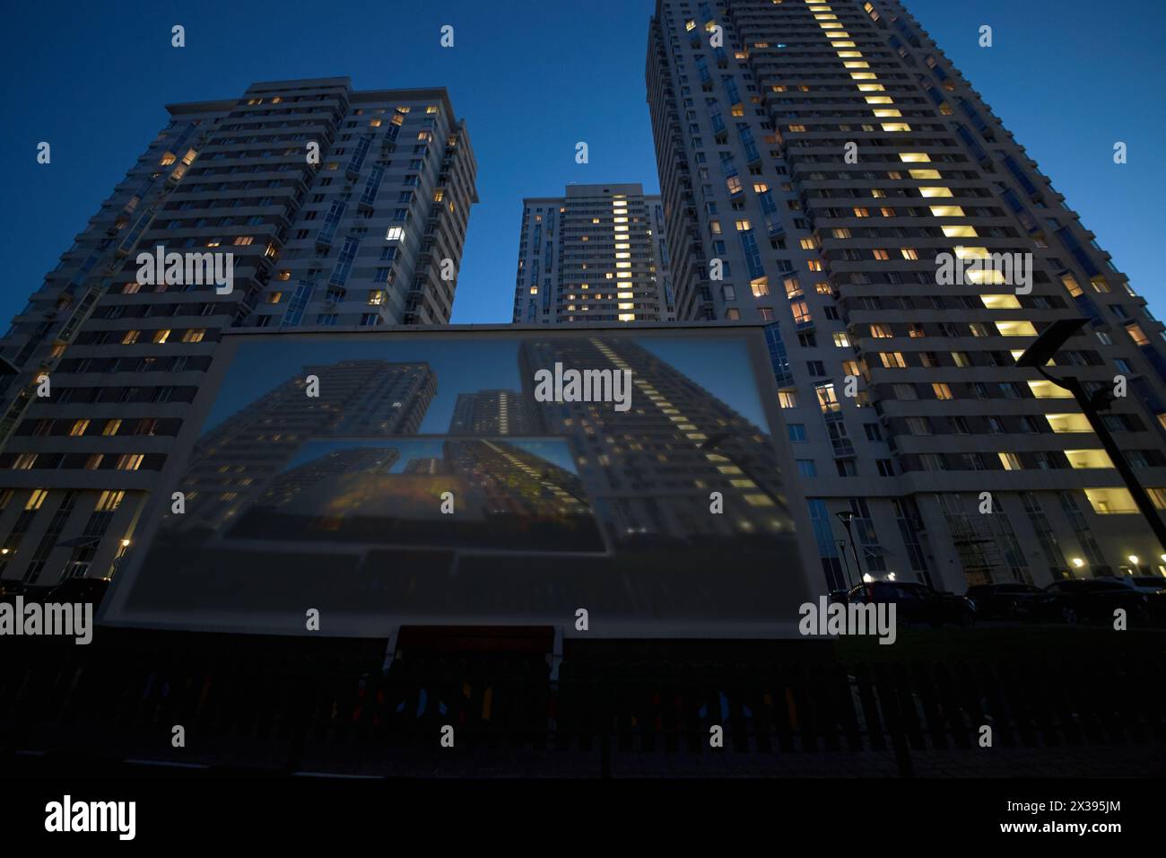 Translaion picture onto the big screen from notebook in the yard of a ...