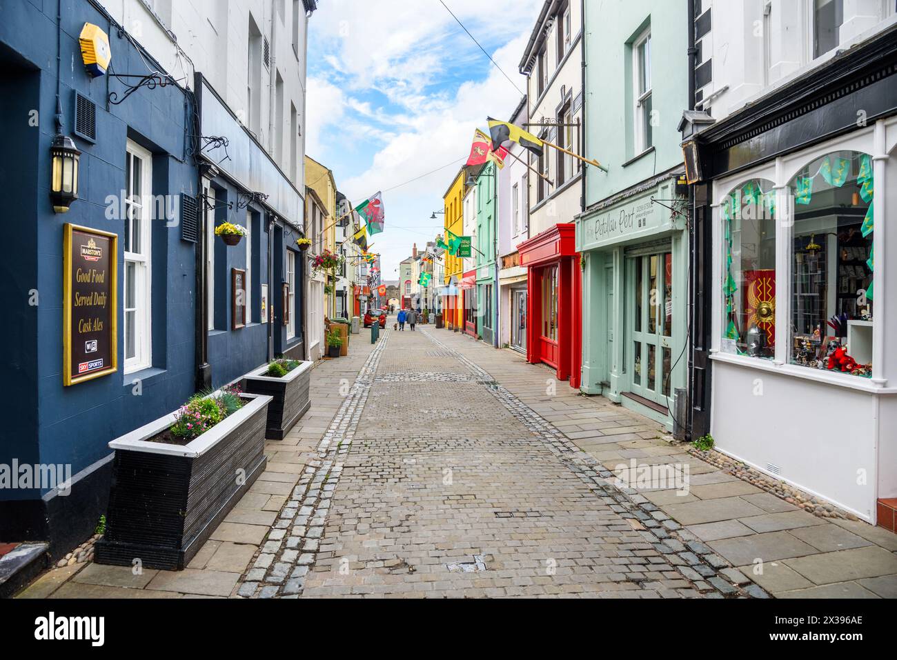 People walking along Palace street in Caernarfon old town Stock Photo ...