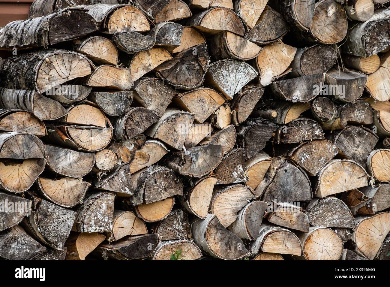 Pile of firewood. Preparation of firewood for the winter and use for ...