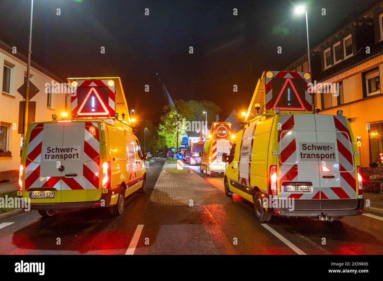 Security and escort vehicles for the transport of a 68 meter long, 22 ...