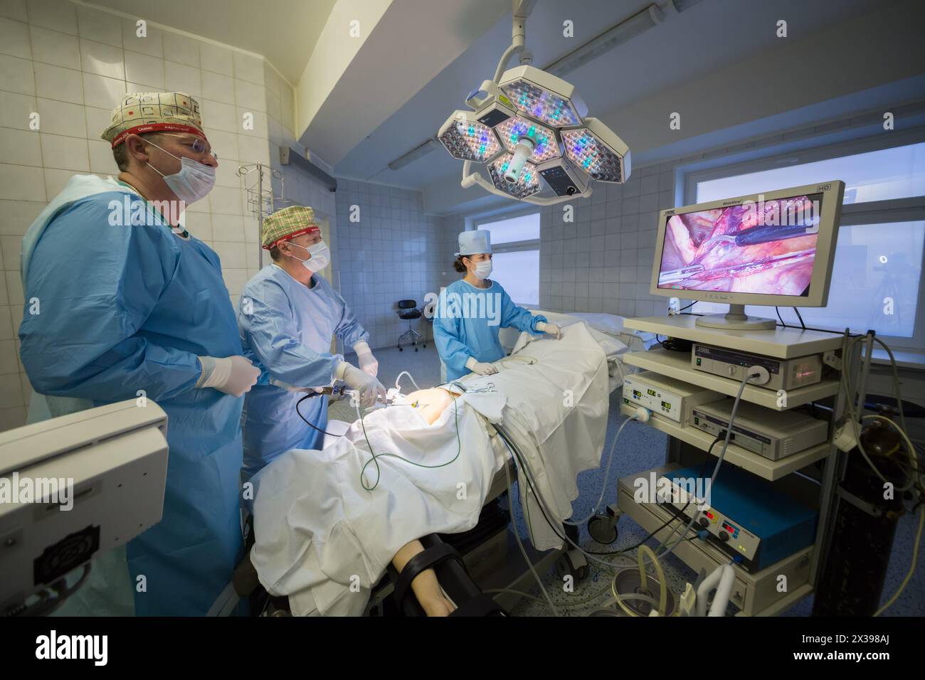 RUSSIA, MOSCOW - 01 SEP, 2015: Three people are removing trumor at the ...