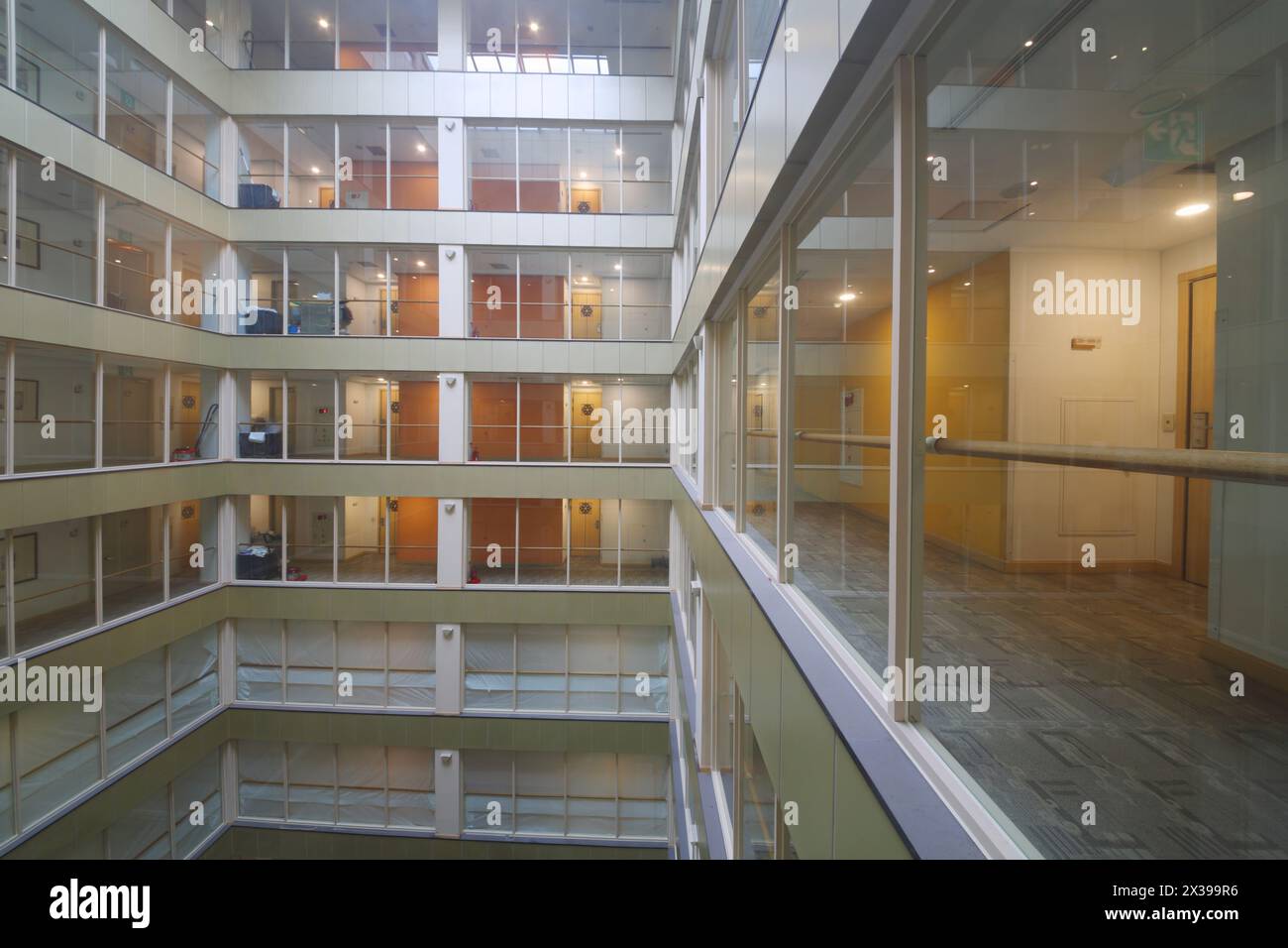 Storey with windows and rooms of empty highrise hotel building with ...