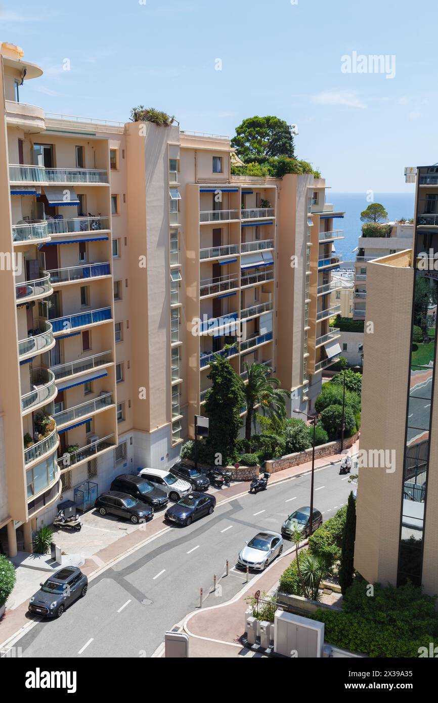 View of apartment building and street of one of densely populated ...