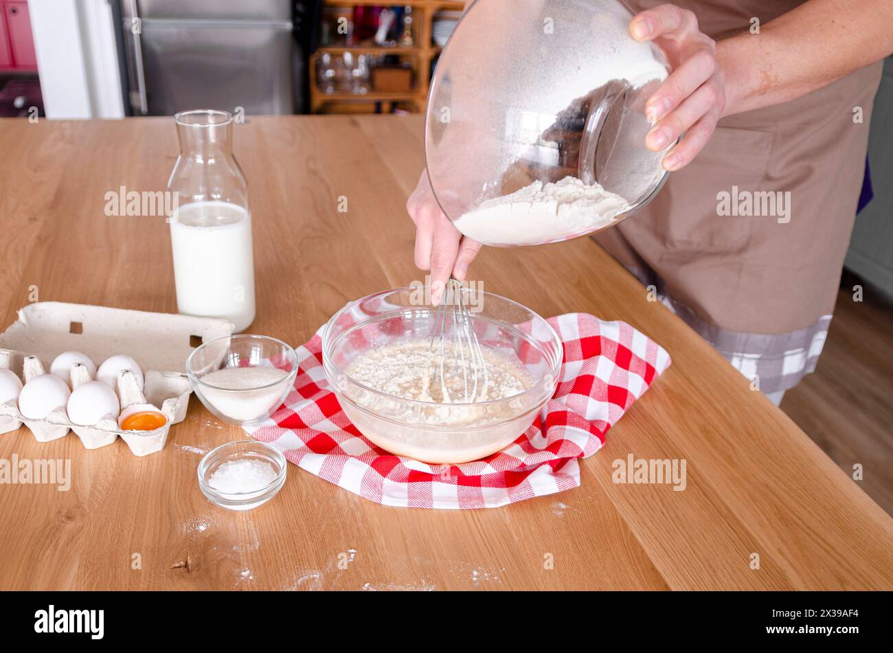 The process of preparing traditional dishes from flour Stock Photo - Alamy