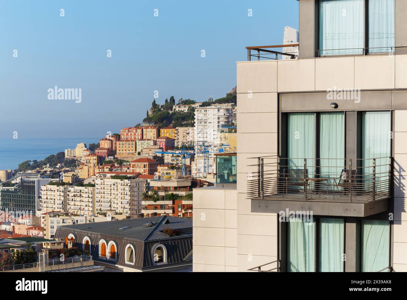 part of wall of building with balcony and views of coast and area ...