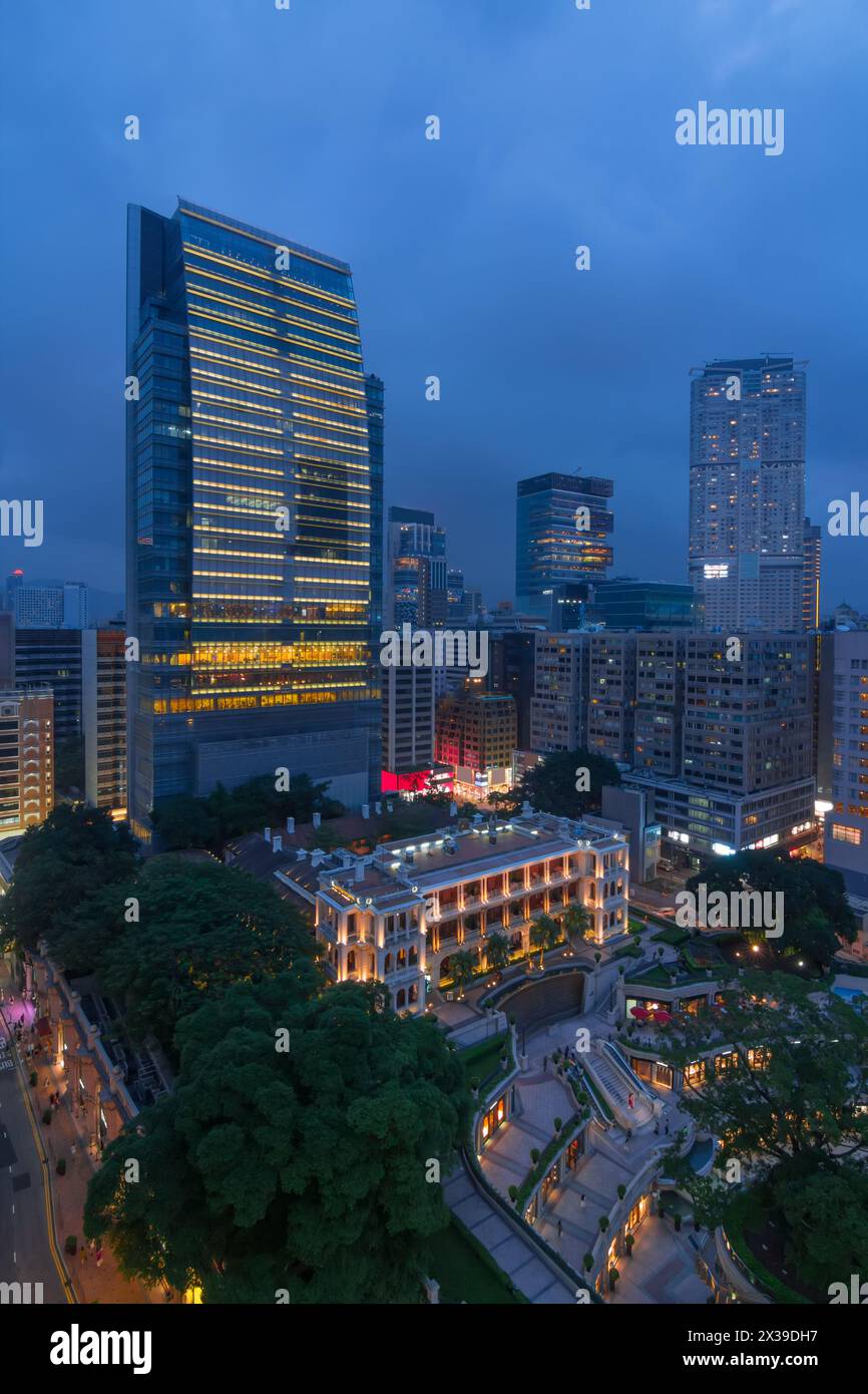 Skyscrapers and classical building with columns, stairs and galleries ...