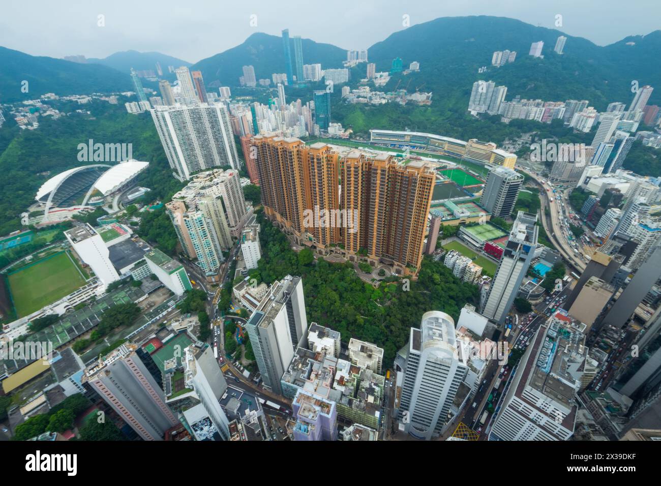 High skyscrapers, office buildings and green mountains in Hong Kong ...
